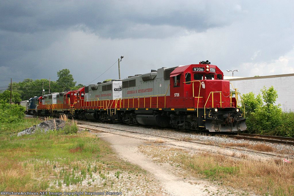 GNRR 9706 running north to Tate, while the rain storms move south